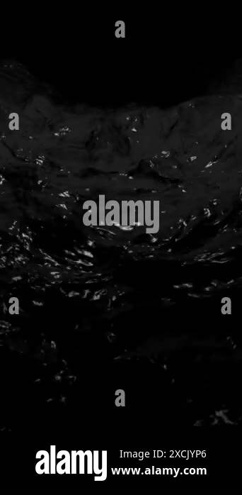 Vertical video - a rippling stream of black crude oil flowing towards ...