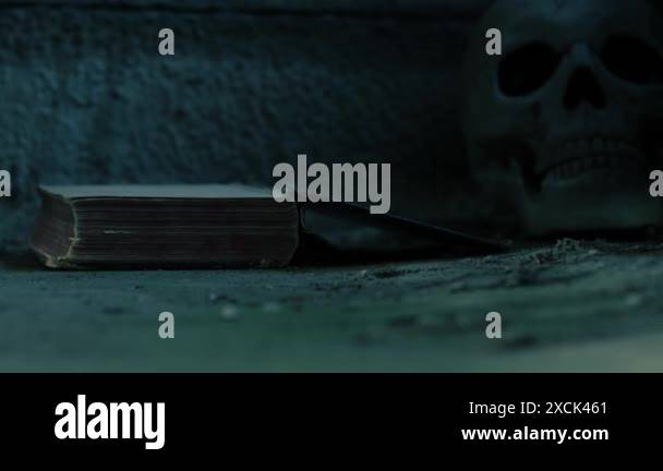 Creepy human skull in lightning storm medium 4k shot selective focus ...