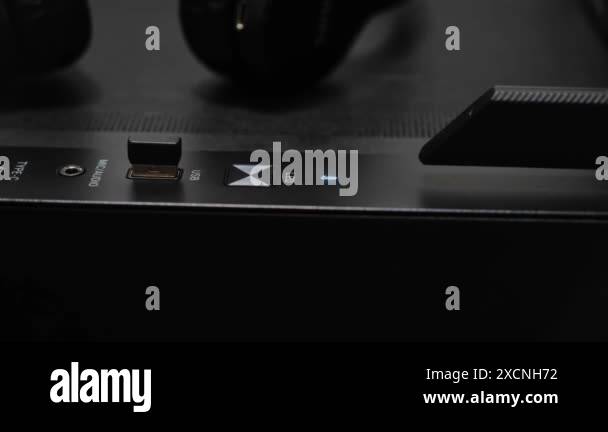 Top panel of a gaming computer with USB ports and indicators. Black pc ...