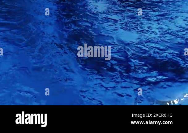 Water Caustic Background. Seamless looped 3D animation of blue water ...