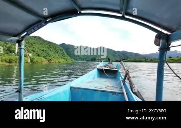 QUANG BINH, VIET NAM- JUNE 17, 2024: Boat transport group of traveler ...