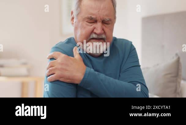 Stress, sick and senior man with shoulder pain, accident or injury for ...