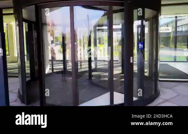 Revolving glass door entrance building Stock Videos & Footage - HD and ...