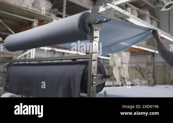Detailed photos of fabric rollers at a textile factory showcasing ...