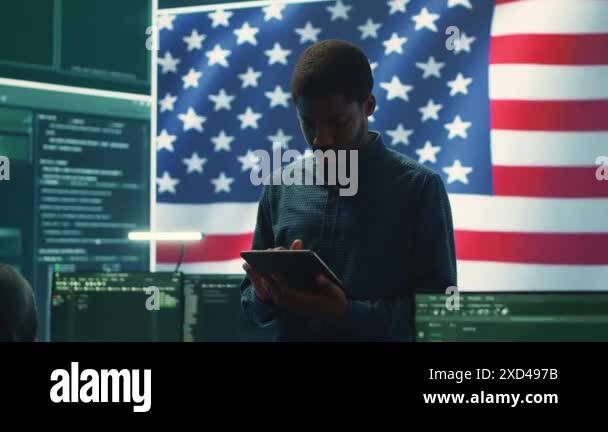 Cybersecurity expert working in a governmental hacking room with the ...