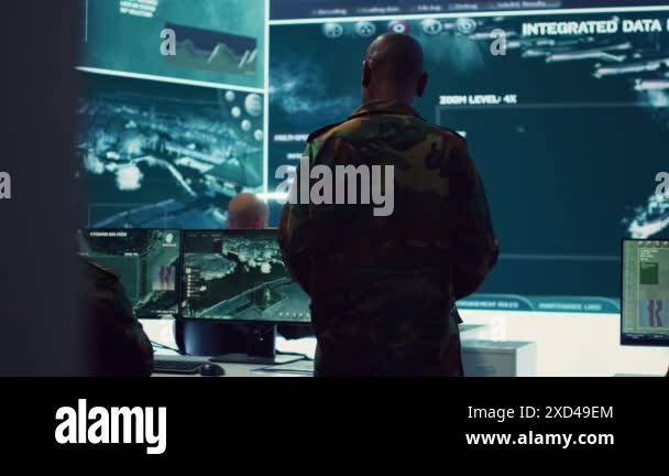 Commander and his crew operating radar systems via CCTV and satellite ...