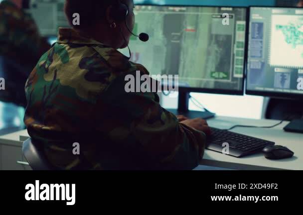 Female army operator registers important information from military ...