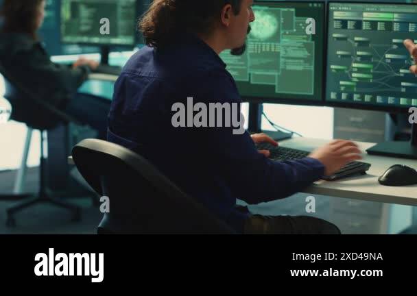 Cyber security experts in a governmental hacking room working on ...