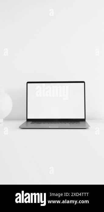 Black and white laptop mock up video background. Modern office worker ...