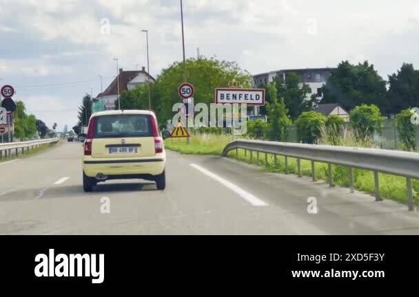 Benfeld, France - June 6 2024 : Entering the town of Benfeld on D83 in ...