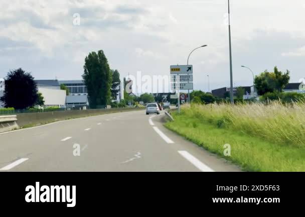 Benfeld, France - June 6 2024 : Highway view of D206 exit on D83 in Bas ...