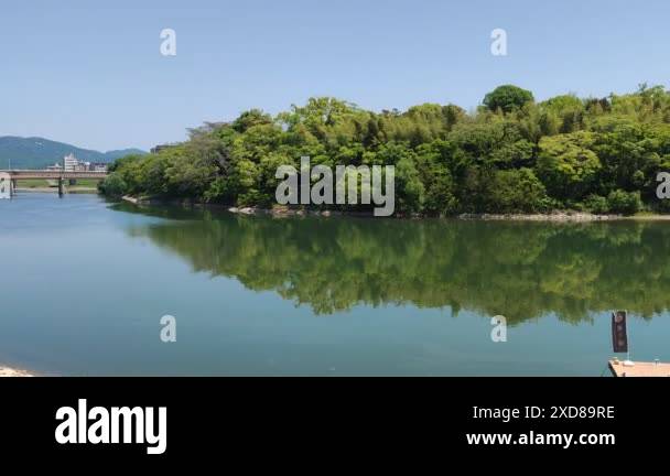 Okayama, Japan- 10 May 2024: Tsukimi bridge over Asahi river at Okayama ...