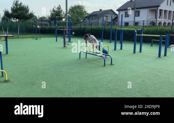 A dedicated young female athlete puts in the hard work, vigorously ...