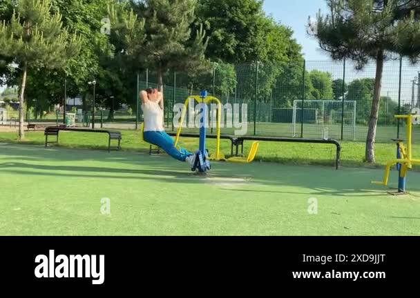 A dedicated young female athlete puts in the hard work, vigorously ...