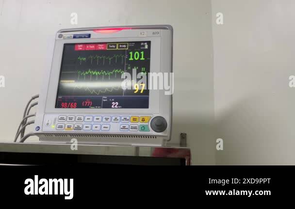 Medical vital signs monitor instrument showing heart rate and oxygen ...