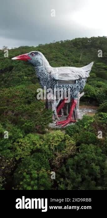 Okinawa, Japan - May 26, 24: Aerial drone footage of a Huge statue of ...