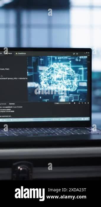 Vertical video Laptop in data center facility with artificial intelligence computing simulating ...