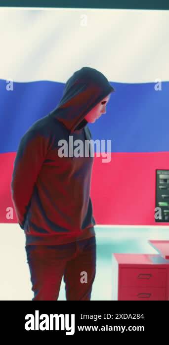 Vertical Video Russian hacker in a governmental IT environment with a ...