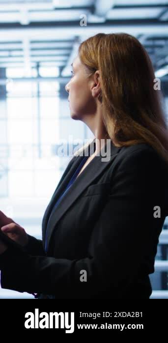 Vertical video System administrator doing yearly maintenance using ...