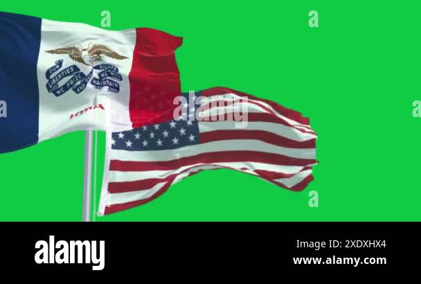Iowa state flag waving in the wind with the American national flag ...