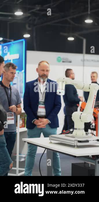 Warsaw, Poland, Robotic Expo 16 May 2024, man showing customers ...