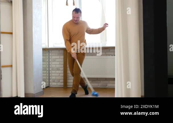 Young housekeeper broom Stock Videos & Footage - HD and 4K Video Clips ...