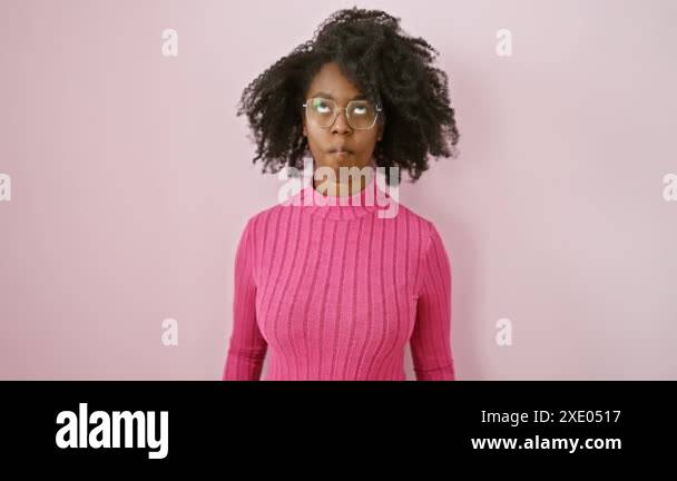 African american woman stands confident making a hilariously funny fish ...