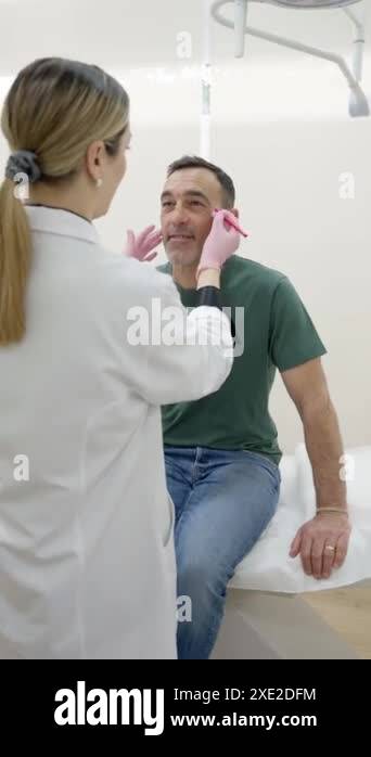 front view of female doctor hand drawing correction lines on middle ...