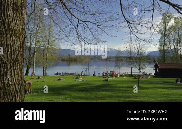 April 20, 2024. Uffing am Staffelsee, Bayern, Germany. People relaxing ...