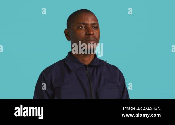 Portrait of security job employee waving hand, being friendly with ...