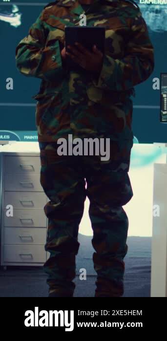 Vertical Video Woman sergeant major working on deployment of electronic ...