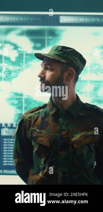 Vertical Video Military IT experts conducting surveillance and ...