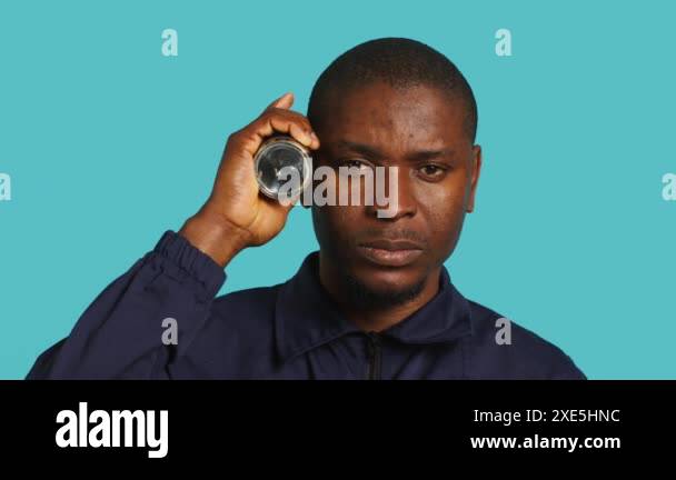 Headshot portrait of security employee tasked with evicting trespassers ...