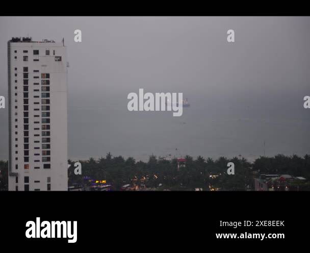 An aerial view of the South China Sea with skyscrapers in the ...