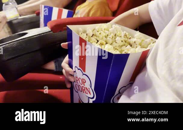 Popcorn eating Stock Videos & Footage - HD and 4K Video Clips - Alamy