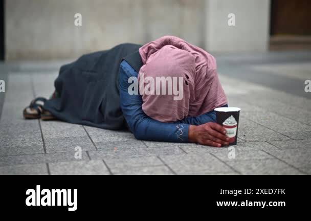 Homeless woman on street Stock Videos & Footage - HD and 4K Video Clips ...
