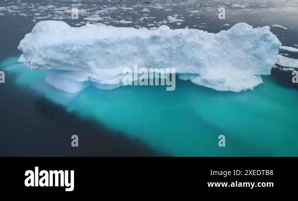 Antarctica melting blue water iceberg. Antarctic ocean environment ...