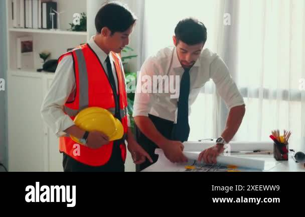 Top view of skilled business man and smart colleague design house ...