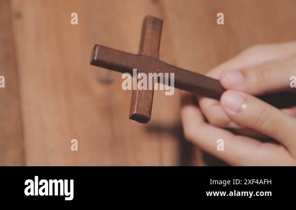 Young hand on cross Stock Videos & Footage - HD and 4K Video Clips - Alamy