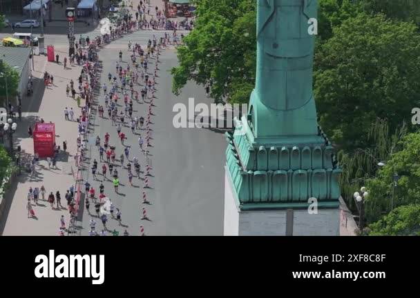 Riga Rimi Marathon 2024. Aerial view on crowd of people running through ...