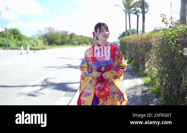 This captivating slow-motion video features a young Japanese woman in ...