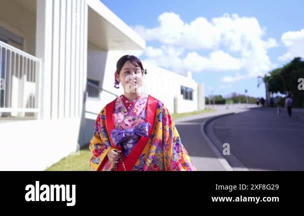 This captivating slow-motion video features a young Japanese woman in ...