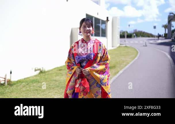 This captivating slow-motion video features a young Japanese woman in ...