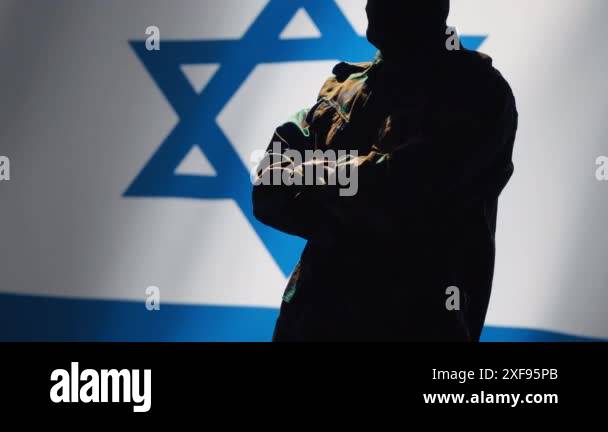 Mossad operator wearing mask to remain anonymous standing proud in ...