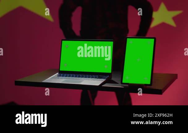 China army soldier using isolated screen laptop and tablet to identify ...