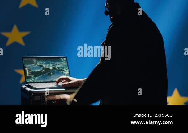 European Union military dispatcher looking at surveillance broadcast ...