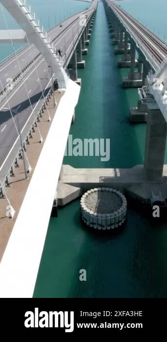 Huge white bridges over the ocean. Shot.Paved roads connecting the ...