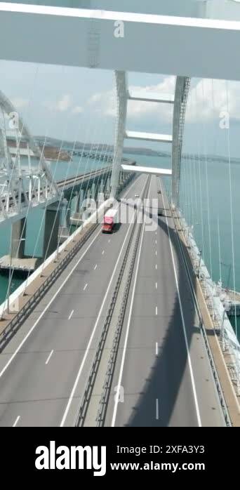 Huge white bridges over the ocean. Shot.Paved roads connecting the ...