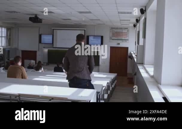 Student leaving classroom Stock Videos & Footage - HD and 4K Video ...