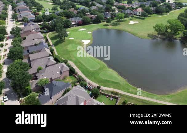 Expensive golf course houses with concrete titles, roof shingles in ...